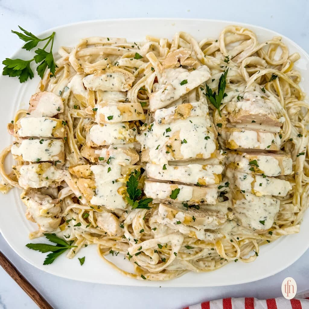 Crockpot Garlic Parmesan Chicken Pasta - The Feathered Nester